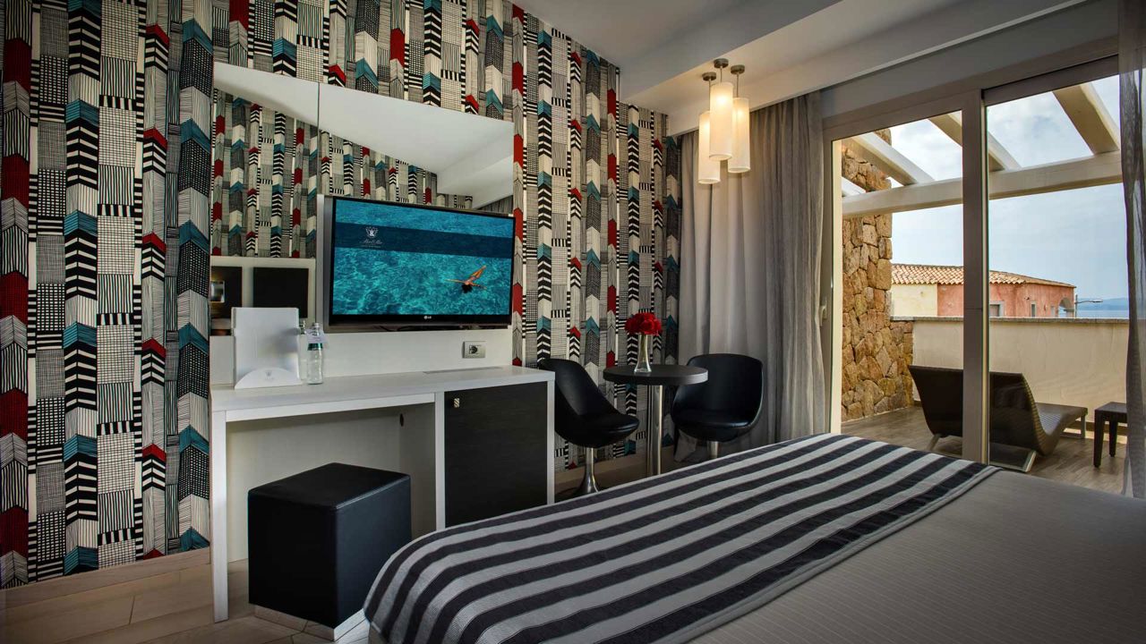 Enjoy a relaxing holiday in the Ma&Ma's Deluxe Room, in Sardinia