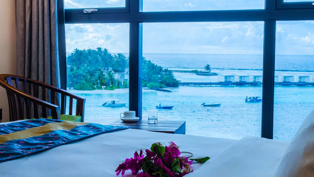 Choose the Deluxe Sea View of Beach Hotel Guraidhoo in Maldives