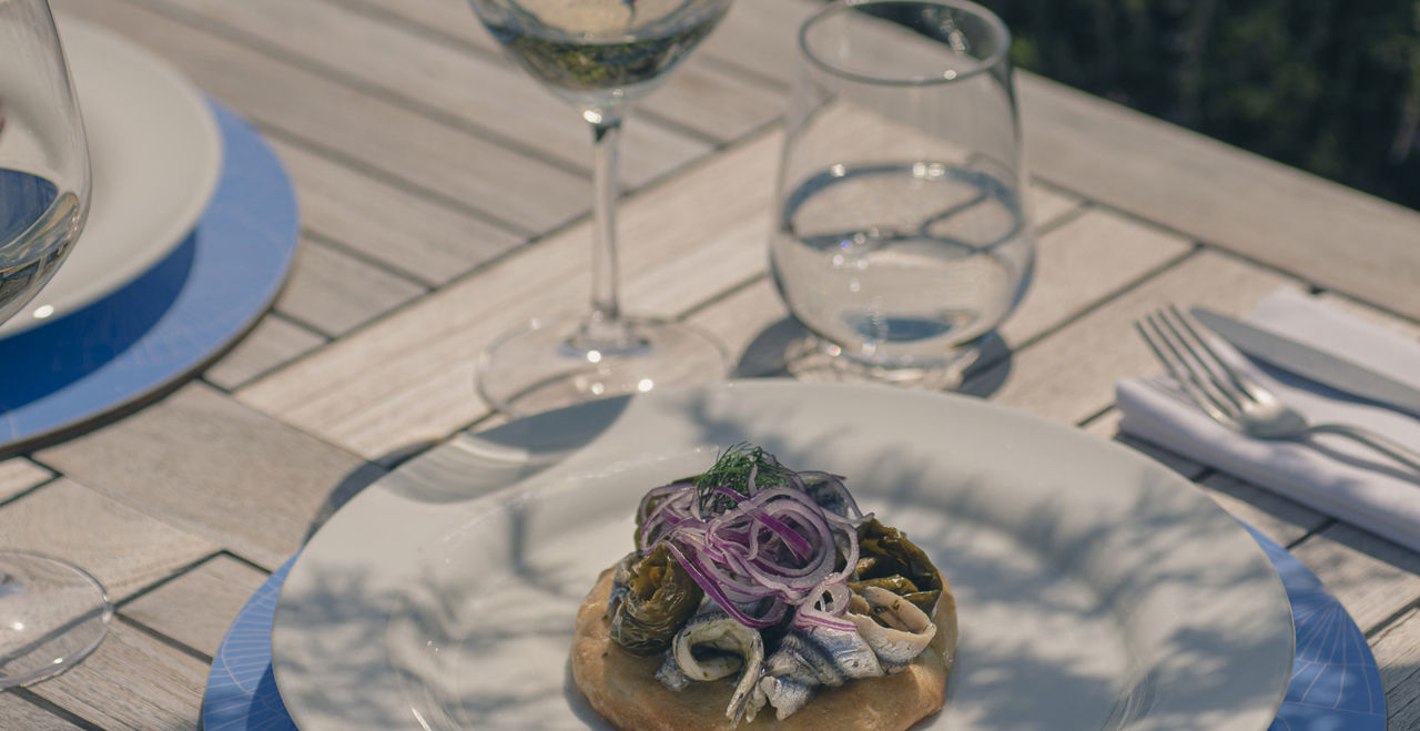 Reserve a table at Stromboli Restaurant of Capovaticano Resort